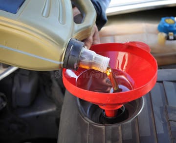 Oil changing stock image. Image of pouring, container - 28335989