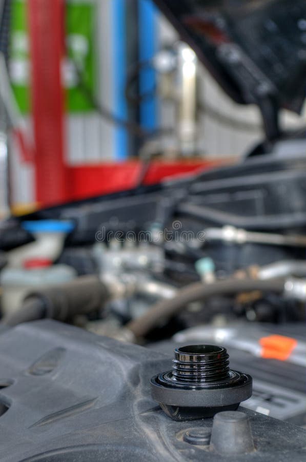 Oil changing stock image. Image of mechanic, bottle, plastic - 29011739