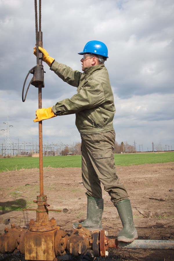 Oil Company Worker on the Well Stock Image - Image of controls, fossil ...