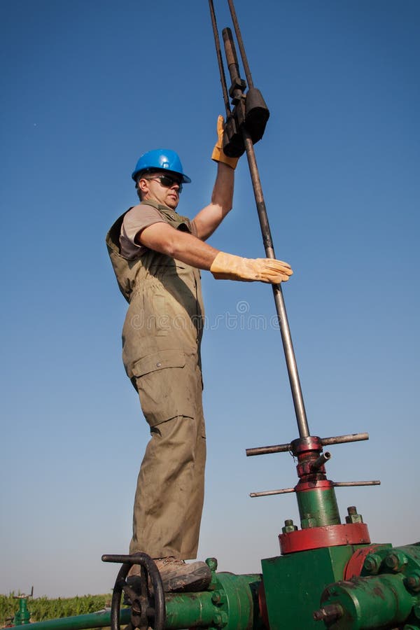 Oil Company Worker on the Well Stock Image - Image of controls, fossil ...