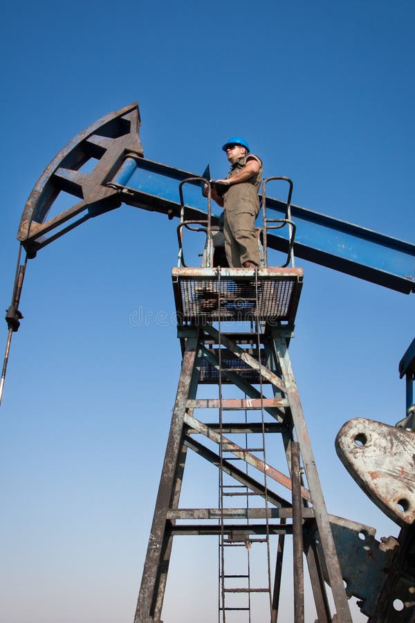 Man Working on Oil Rig stock image. Image of darrin, heavy - 5151831