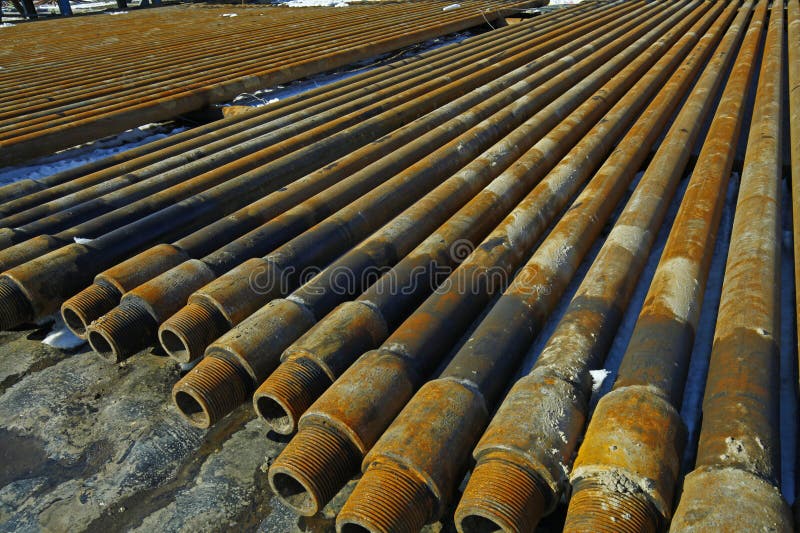 Oil drill pipe and drill stock image. Image of equipment - 347452707