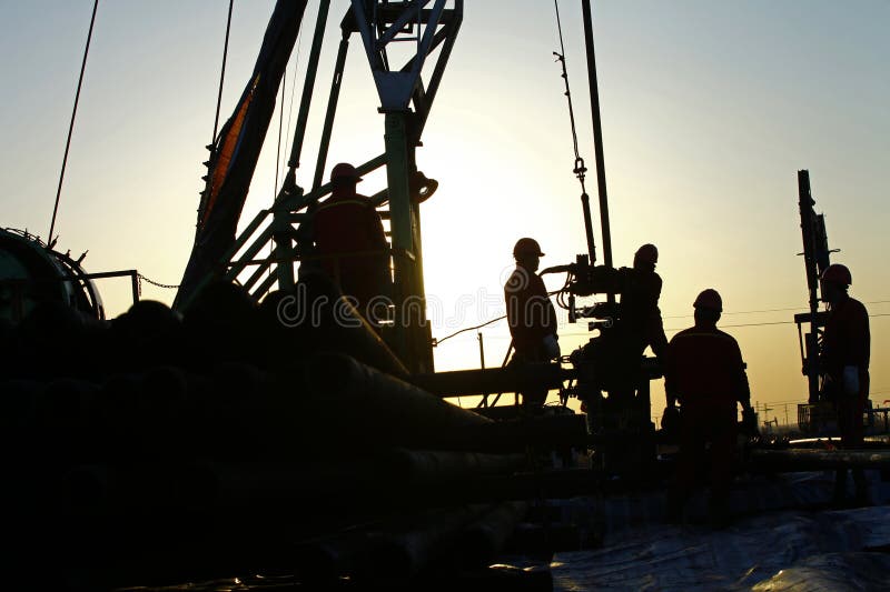 Oil Drilling Exploration, the Oil Workers are Working Stock Image ...