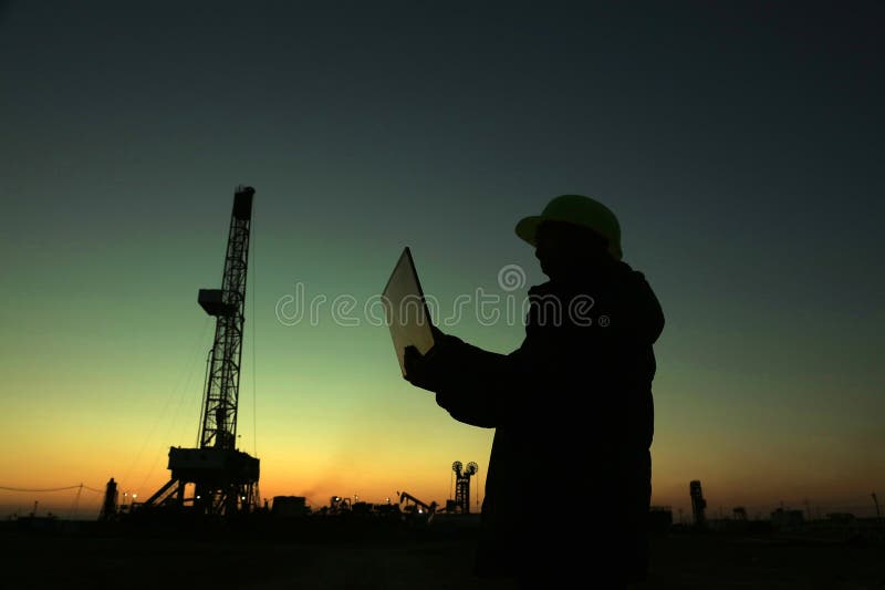 Oil Drilling Frame and Exploration Technician Stock Image - Image of ...