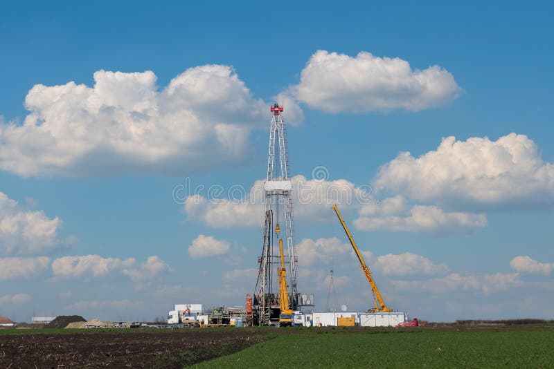Oil Drilling Rig and Cranes on Field Stock Image - Image of fracking ...