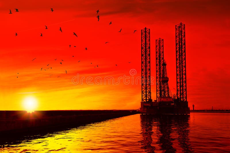 Oil rig at sunset stock photo. Image of gasoline, crane - 30043102