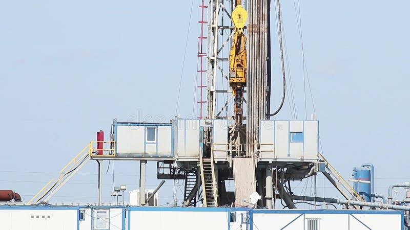 Top Drive System TDS and Derrick of Oil Drilling Rig Stock Footage ...