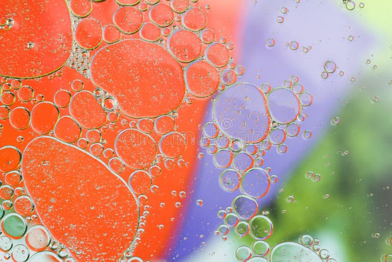 Oil Drops Floating in Water Abstract Multi Color Background. Stock ...