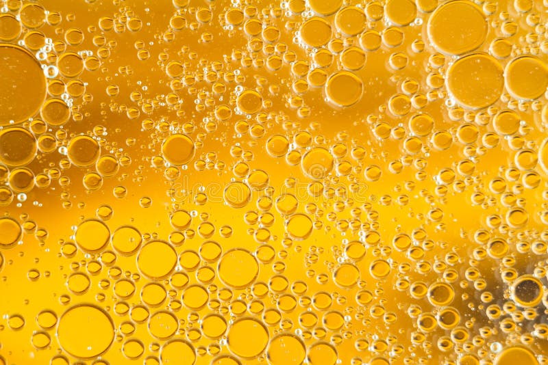 Oil Drops Floating in Water Abstract Orange Color Background. Stock ...