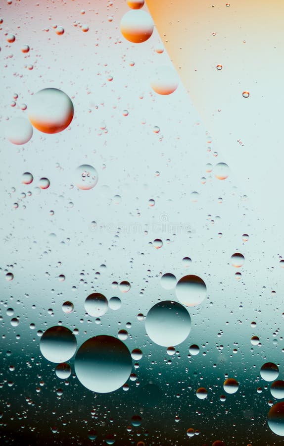 Oil drops on water stock photo. Image of circular, liquid - 125917970