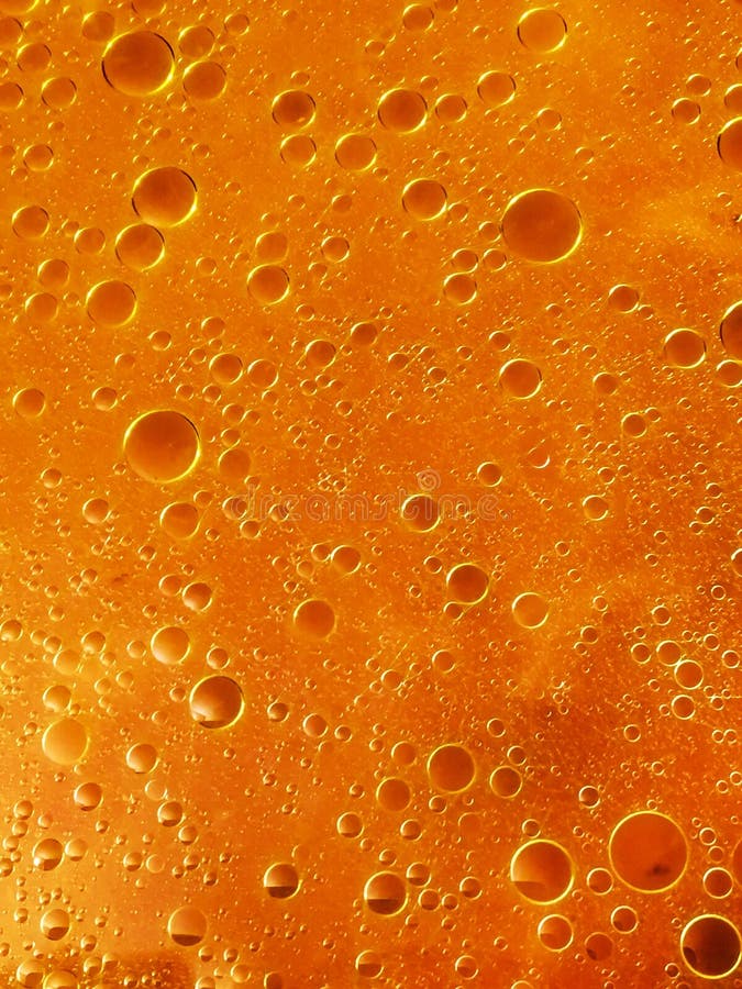 Oil drops on the water stock image. Image of drop, bubbles - 66049533