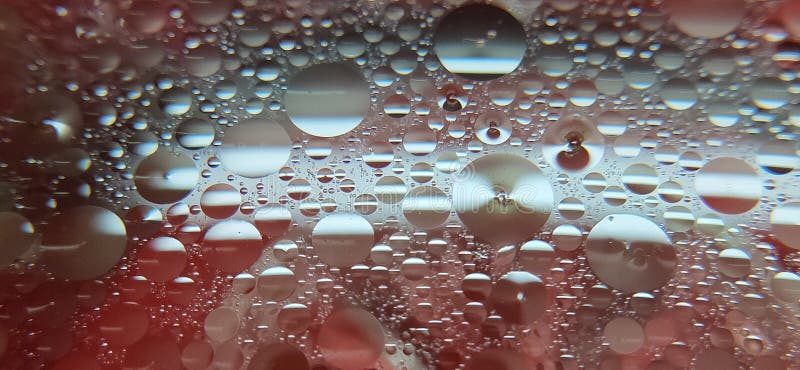 Oil Drops on Water Surface. Green Colour Oil Droplets on Water Surface ...