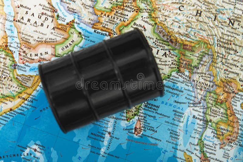 Oil Drum with Crude Petroleum Lying Down on a Map Stock Photo - Image ...