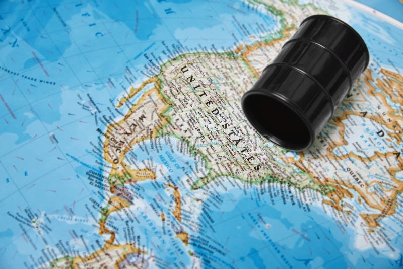 Oil Drum with Crude Petroleum Lying on a Map Stock Photo - Image of ...