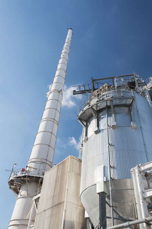 Oil tank and chimney stock image. Image of generation - 88963423