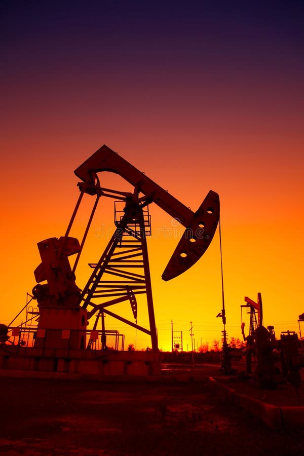 The Evening of Beam Pumping Unit in Silhouette Stock Photo - Image of ...