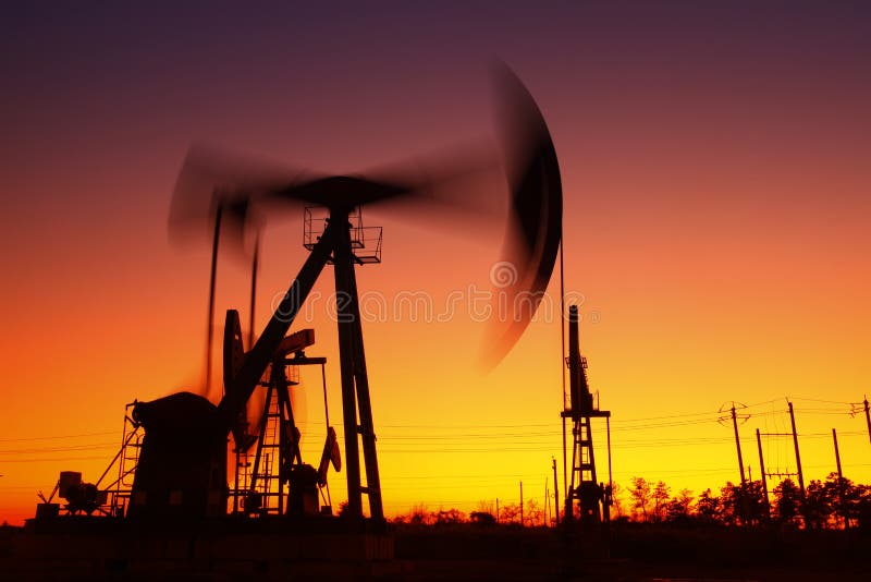 The Evening of Beam Pumping Unit in Silhouette Stock Photo - Image of ...