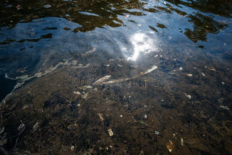 Oil and Garbage Pollution in the Water. Stock Photo - Image of business ...