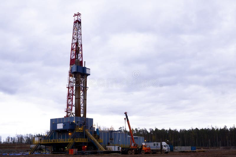 Oil and Gas Drilling Rig Onshore Dessert with Dramatic Cloudscape. Oil ...