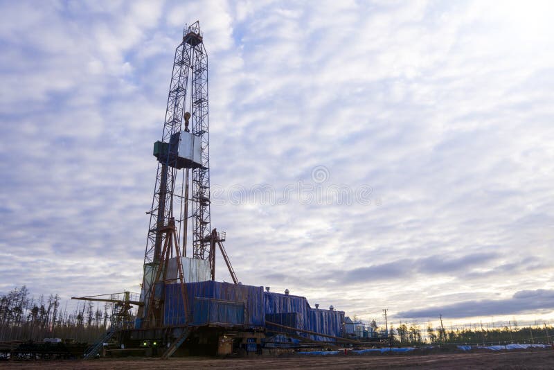 Oil and Gas Drilling Rig Onshore Dessert with Dramatic Cloudscape. Oil ...