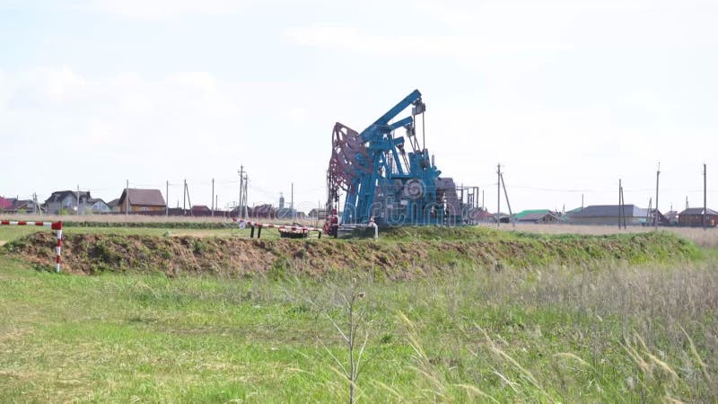 Oil and Gas Industry. Oil Pumps Pump Oil in the Field Stock Video ...