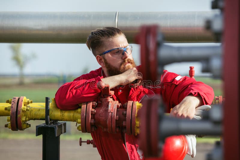Oil and Gas Industry Worker. Engineer in Refinery Plant. Stock Photo ...