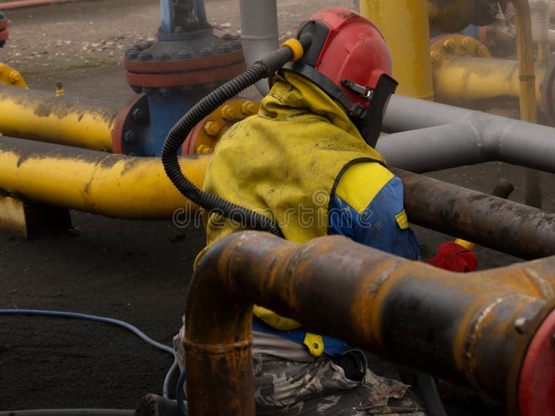 Manual Sandblasting or Abrasive Blasting To Metal Pipe. Abrasive ...