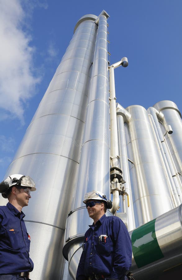 Oil And Gas Workers With Pipelines Stock Photo - Image of industry ...