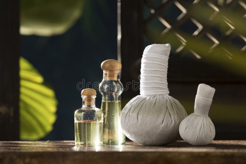 Oil and Herbal Compresses on Color Back. Stock Image - Image of ...
