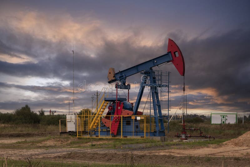 Oil Industry. Oil Rigs. Oil Pumps at Sunset Stock Photo - Image of ...