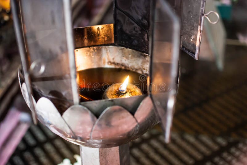 Oil lamp in Buddha temple stock image. Image of candle - 80302137