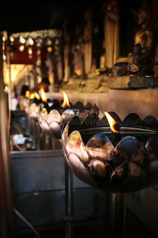The Oil Lamp in Front of the Buddha Statue Stock Image - Image of lamp ...
