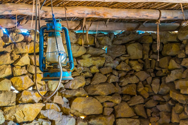 An Oil Lamp Hanging in a Wooden Hut....IMAGE Stock Image - Image of ...