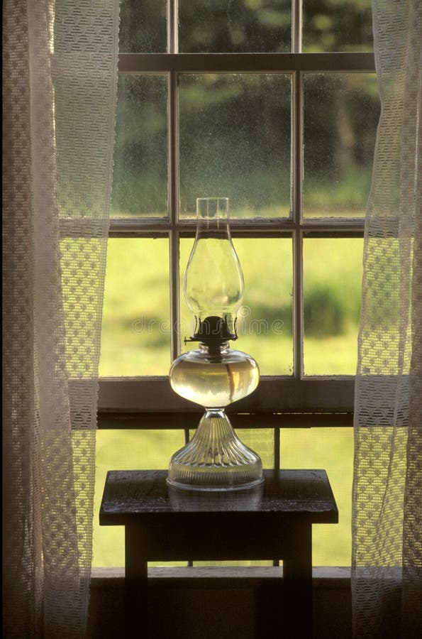 Oil lamp in window stock photo. Image of house, antique - 5560684