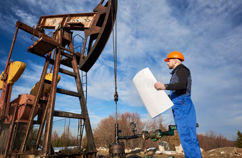 Oil Man Controlling Work of Pump Jack. Stock Photo - Image of jack ...