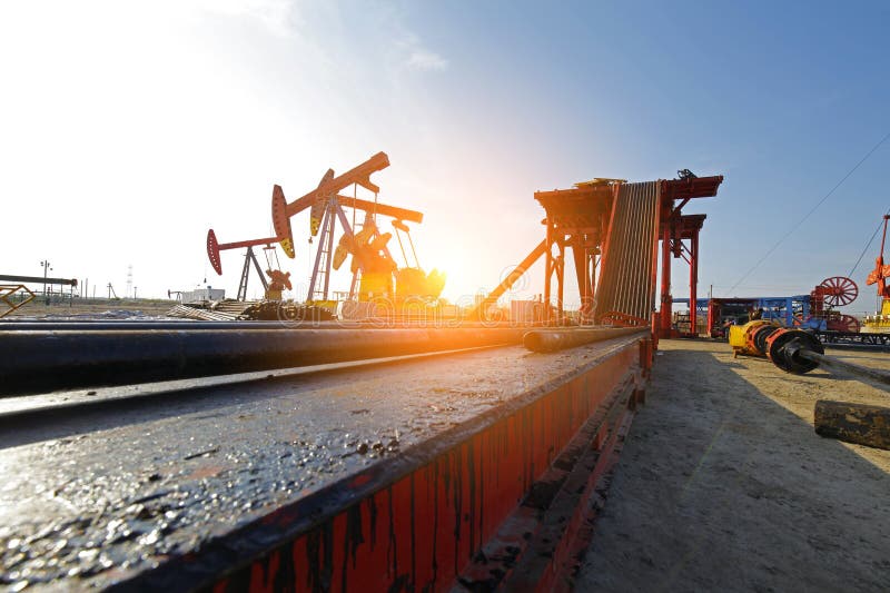 Oil Pipe and Oil Drilling Rig Equipment Stock Photo - Image of sleeve ...