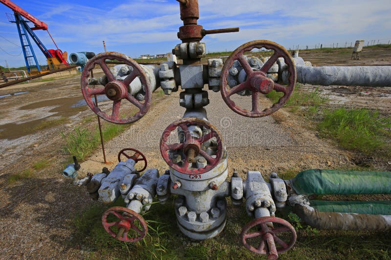 Oil pipes and valves stock image. Image of fuel, aqueduct - 375109547