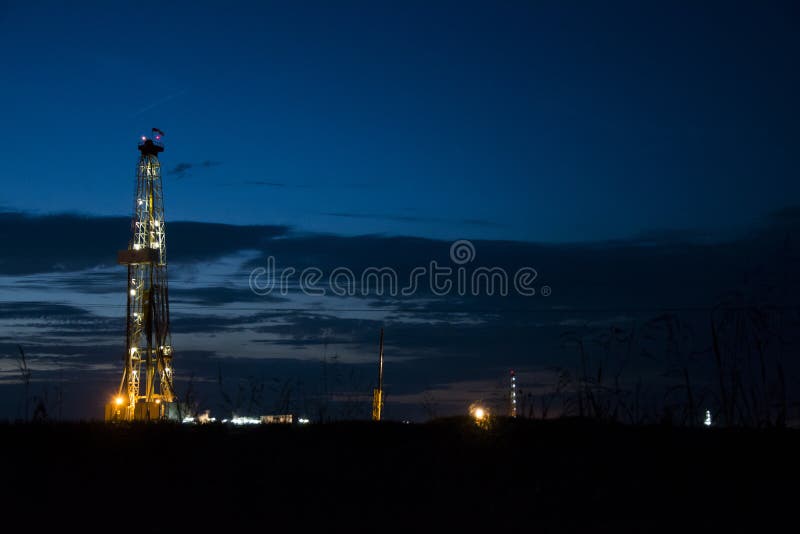 Oil platform at night stock image. Image of natural, rigs - 44336163