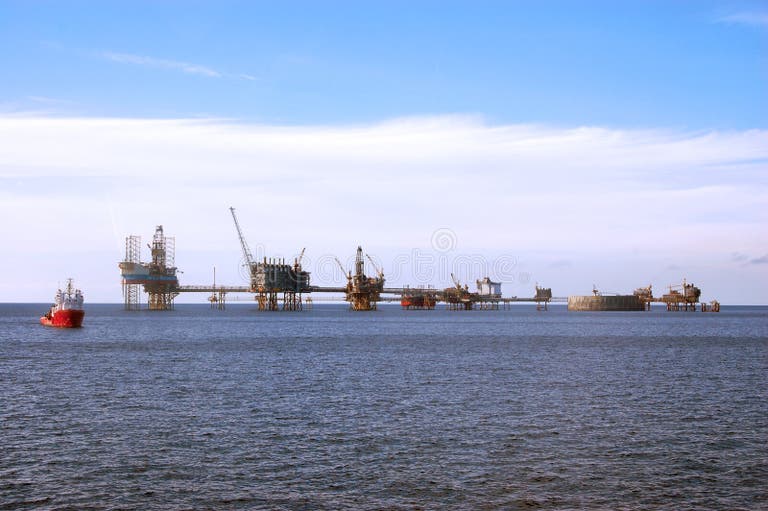 Oil platforms in North Sea stock image. Image of clouds - 11292197