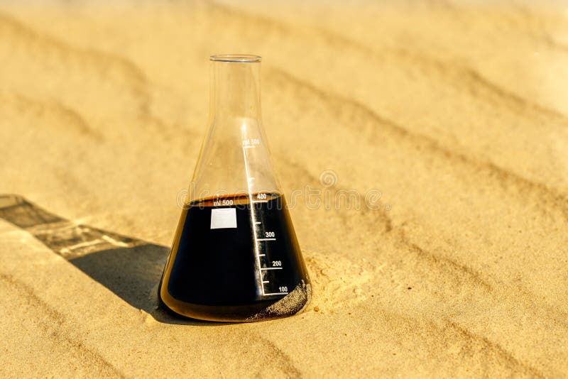 Oil produced in the flask stock photo. Image of barrel - 138637606