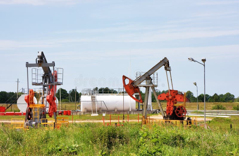 Tree and oil drilling rig stock photo. Image of black - 6895372