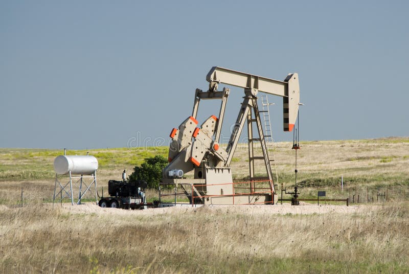 Pumpjack Pumping Oil, Snow Capped Mountains Stock Image - Image of pump ...
