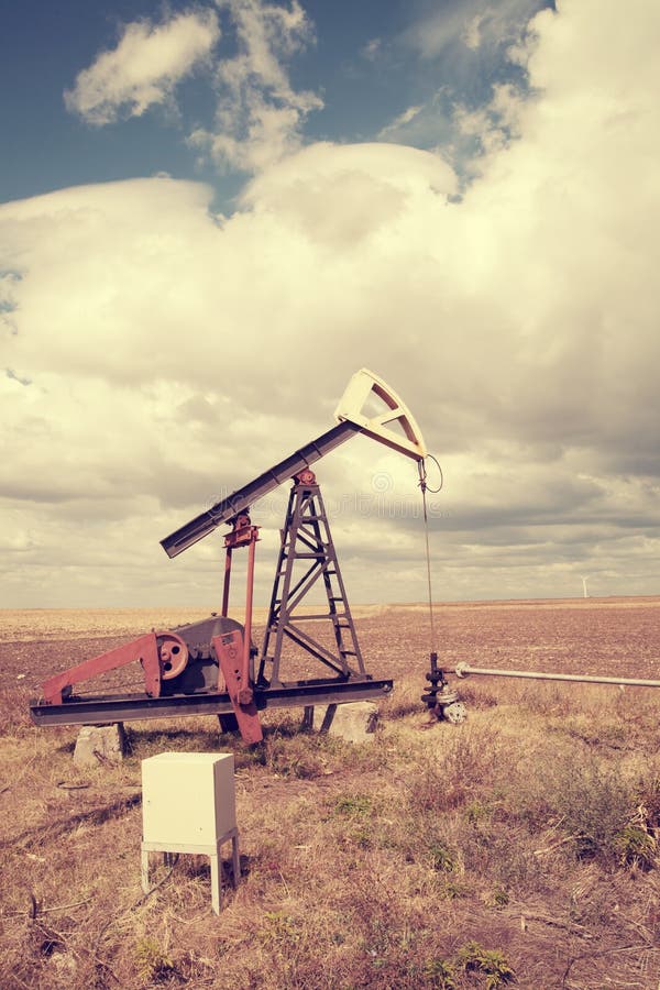 Oil pump, cloudy sky stock photo. Image of drilling, ecology - 35549732