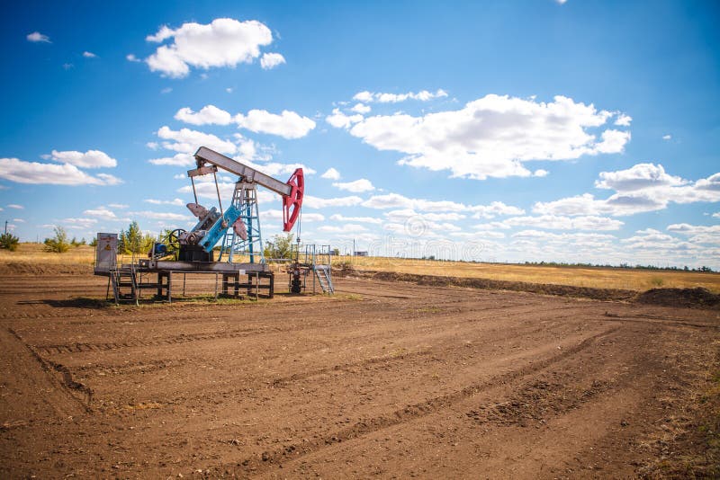Oil pump in the field stock photo. Image of natural, drill - 10496916