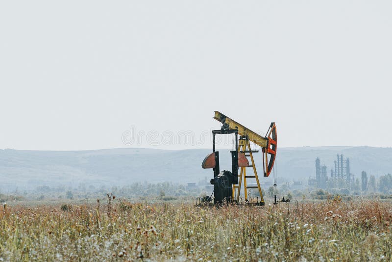 Oil pump on field stock photo. Image of plant, extraction - 247480488