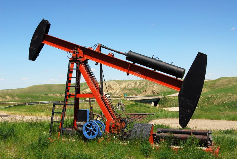Oil pump jack stock photo. Image of industrial, meadowland - 5665740
