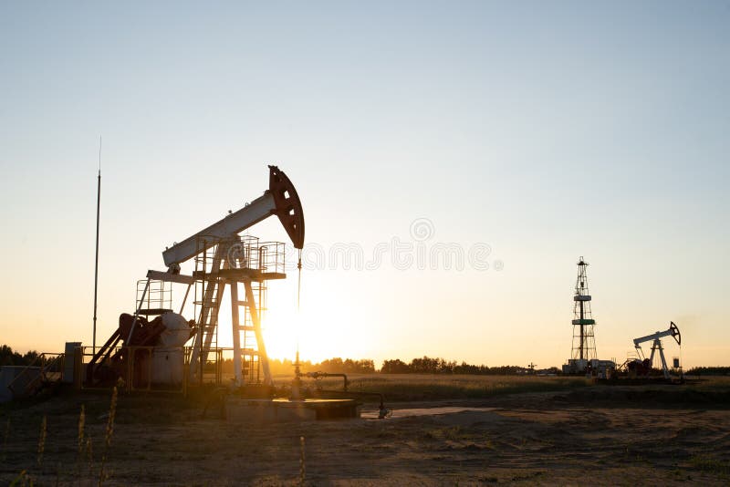 Oil Pump on orange sunset. stock image. Image of diesel - 227523101