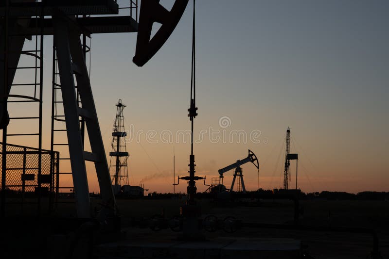 Oil Pump on orange sunset. stock image. Image of fuel - 227523201