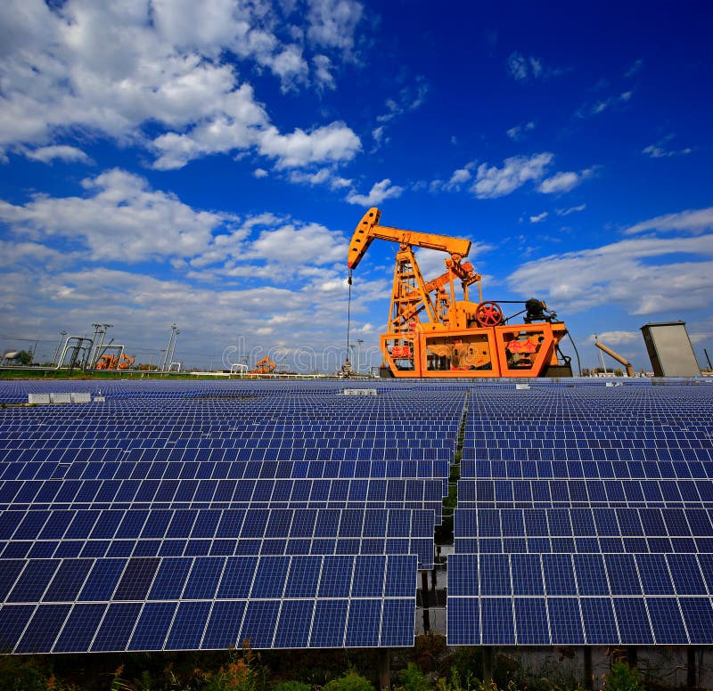 Oil pump with solar panels stock photo. Image of technology - 222238638