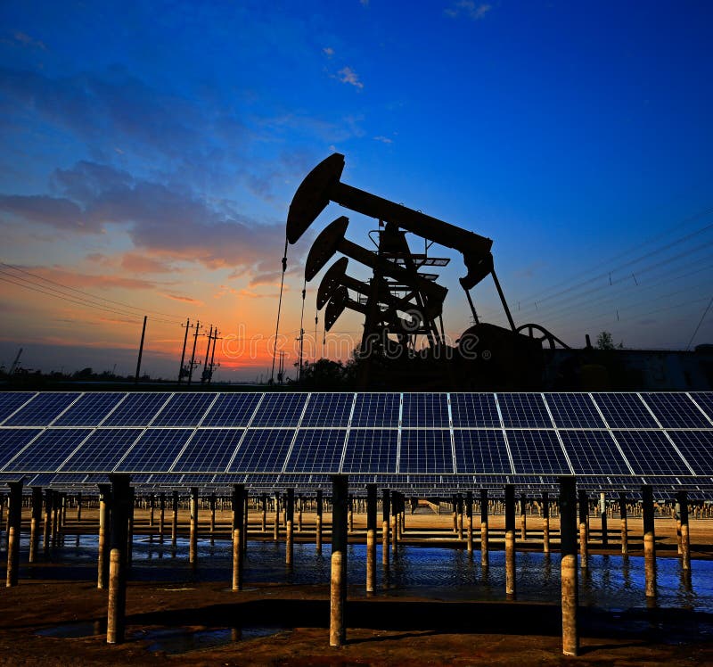 Oil pump with solar panels stock photo. Image of tube - 247437676